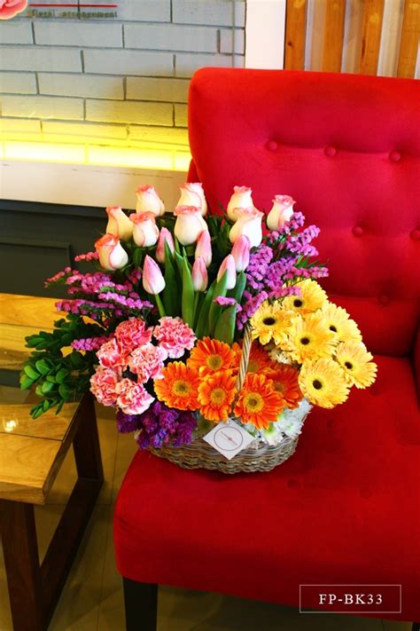 6 Tulips 9 Imported Roses 1 Dozen Gerberass 6 Carnations With Mums