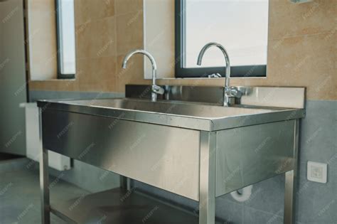 Premium Photo Industrial Stainless Steel Sink In Bathroom Of An Workshop