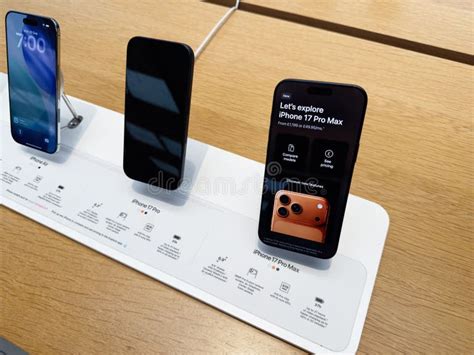 New Iphones On A White Display Stand In A Tech Store Showroom With Sleek Devices Editorial