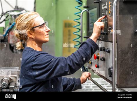Female Factory Worker Operator Working In Numerical Control Sector