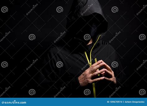 Hacker With A Hood And Blue Binary Code Matrix Hacking Confidential Secret Data Royalty Free