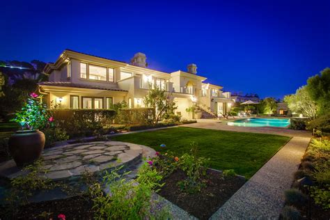 Beautiful Mansion With Pool And Lush Green Backyard