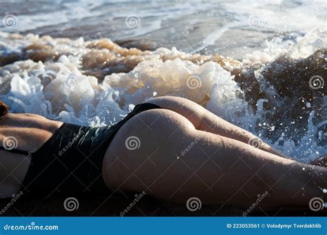 Summer Of Young Girl With Tanned Body Firm Buttocks In Swimsuit Bikini
