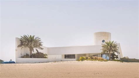 Taep Aap Raises Lighthouse Above White Fortress House In Kuwait