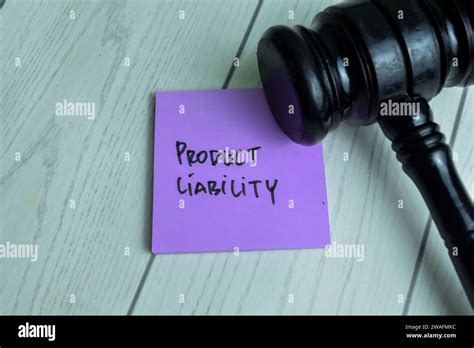 Concept Of Product Liability Write On Sticky Notes With Gavel Isolated