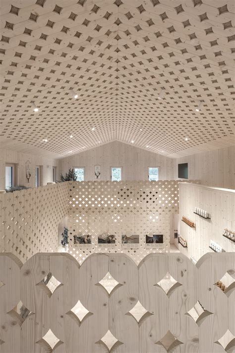 Pedevilla Architects Lines Cookery School With Perforated Timber Panels