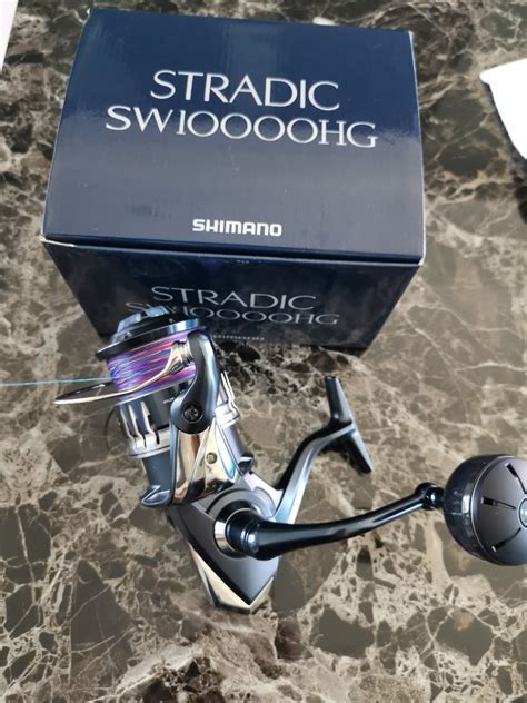 shimno stradic sw10000hg and rod, Sports Equipment, Fishing on Carousell