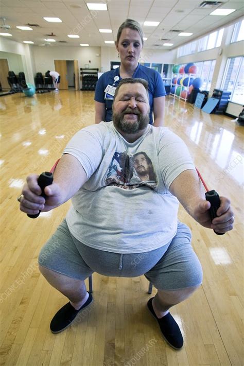 Obese Man Exercising Usa Stock Image C010 6849 Science Photo Library
