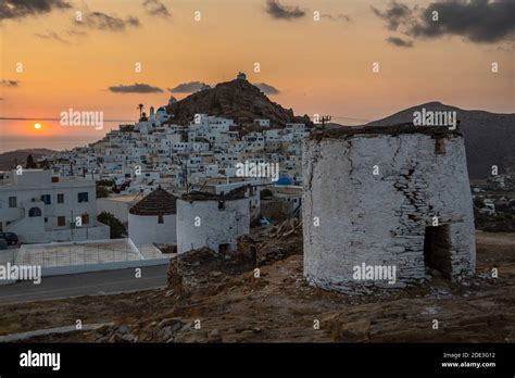 Iconic Traditional Windmills On The Main Square In Chora Yellow