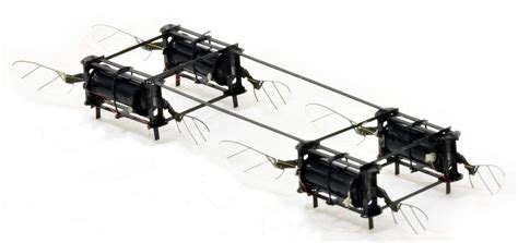 Designing Building And Controlling A Soft Actuated Aerial Microrobot