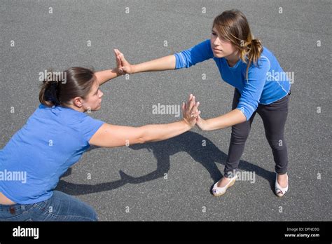 People Pushing Each Other