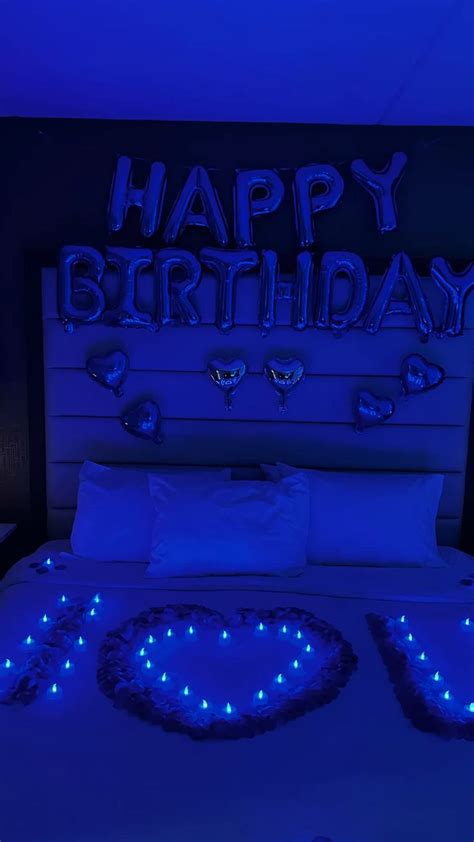 Birthday Surprise Setup With Blue Lights And Heart Shaped Happy Birthday Decor