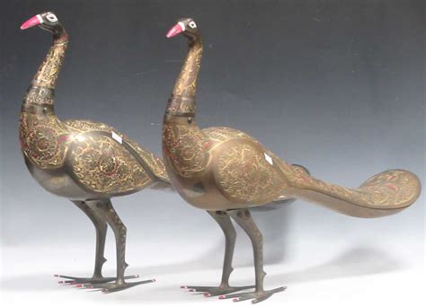 Lot 73 Two Indian Brass Peacocks Decorated With