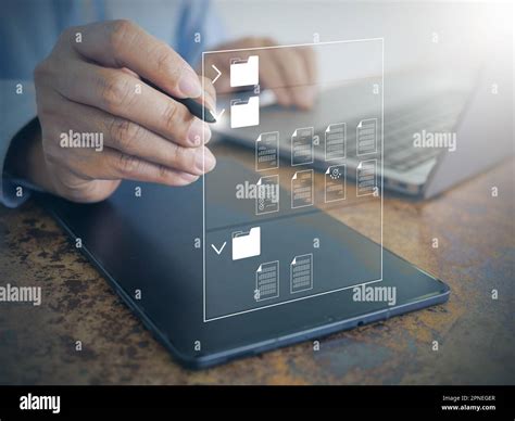 a businessman uses document management system dms on laptop office