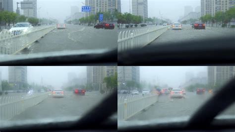 暴雨城市内涝、开车趟水视角视频素材下载
