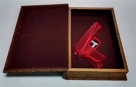 Lot Hollowed Out Faux Book With Water Pistol