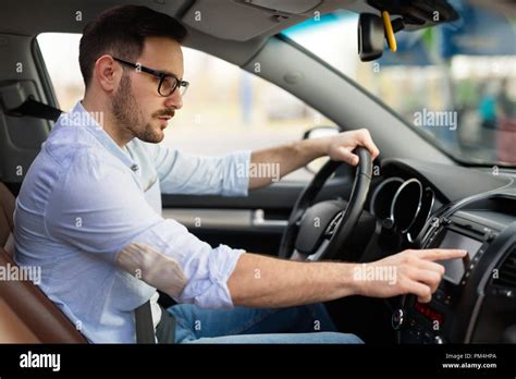 Man Using Navigation System While Driving Car Stock Photo Alamy