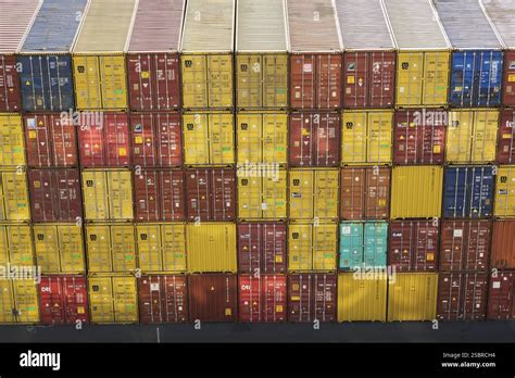 High Angle View Of Stacked Yellow And Reddish Brown Msc Tex And Cai Metal Box Shipping