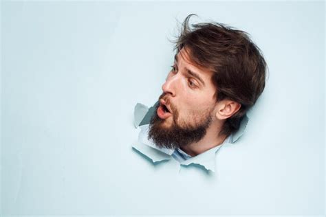 Premium Photo A Mans Head Peeps Out From Behind A Wall Of Emotion Job Career Discontent Person