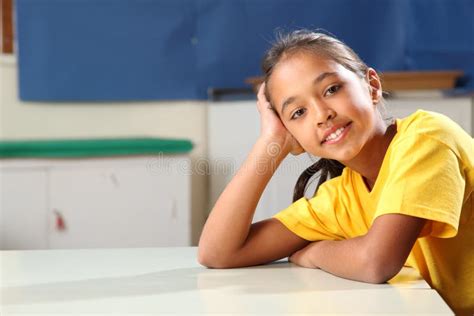 School Girl 10 Relaxed While Sitting At Her Classr Stock Image Image