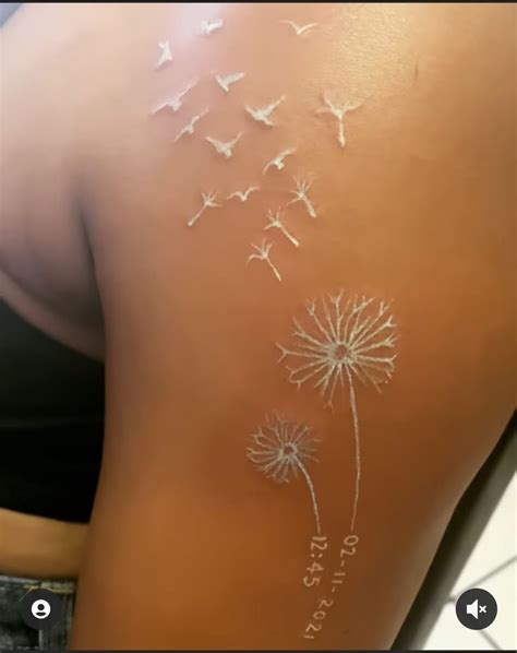 Brown And White Ink Tattoo