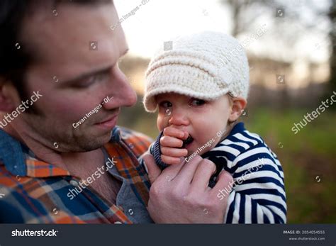 Father Comforting His Crying Daughter Photos Images And Pictures