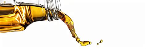 Premium Photo Pouring Oil Lubricant Isolated On A White Background