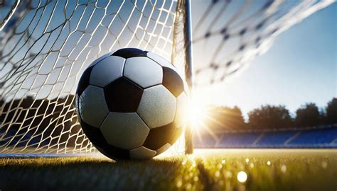 The Soccer Ball Is About To Enter The Goal Netside Viewclose Up Photo