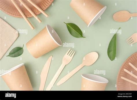 Eco Friendly Tableware On Green Background Top View Plastic Free