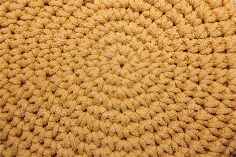 Elegant And Textured Yellow Crochet Pattern Perfect For Enhancing Your