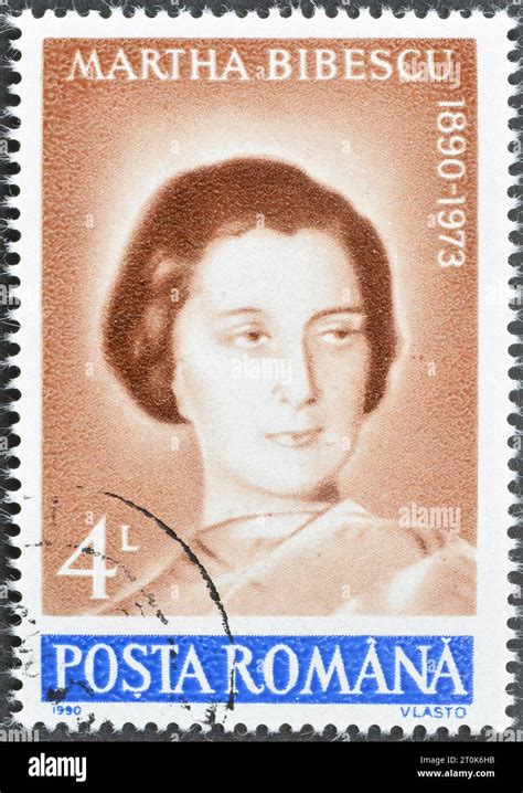 Cancelled Postage Stamp Printed By Romania That Shows Portrait Of Poet Martha Bibescu 1890
