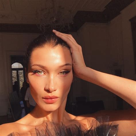 Bella Hadids Radiant Skin Donatella Versaces Dark Smoky Eyes And