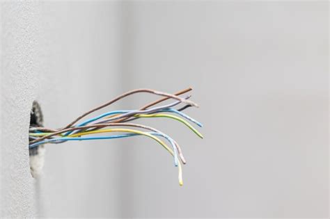 Premium Photo Open Electric Plug At Home With Kind Of Seen Cables