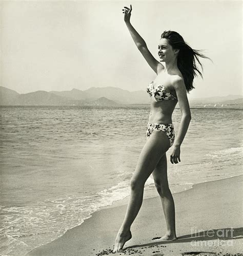 Brigitte Bardot Waving On The Beach Photograph By Bettmann Fine Art