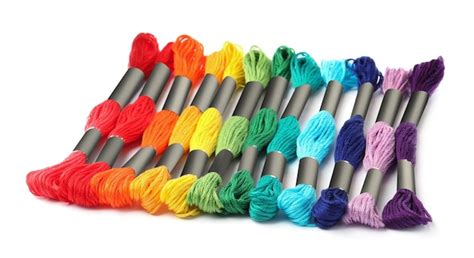 Premium Photo Set Of Colorful Embroidery Threads On White Background