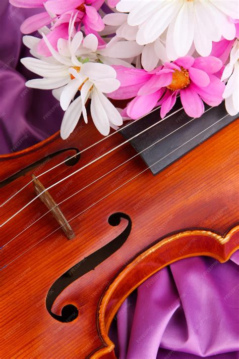 Premium Photo Classical Violin On Fabric Background
