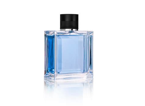 Blue Bottle Of Perfume Close Up Isolated On White Background Premium