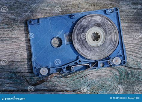 Disassembled Vhs Cassette Components In The Background Stock