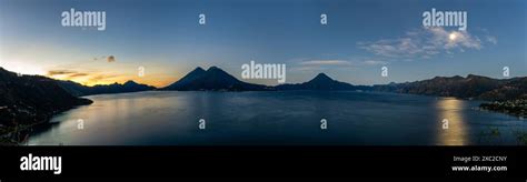 Lake Atitlan With Its Mountains And Volcanoes During The Sunrise Stock