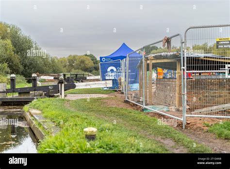 Canal And River Trust Working At A Lock On A Canal Repairing A Collapsed Overflow Control System
