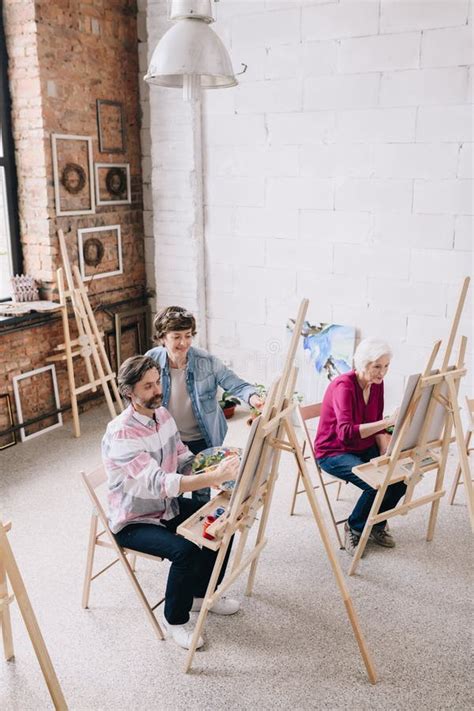 Students Working In Modern Art Studio Stock Image Image Of Retired