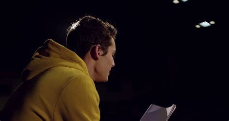 Teenage Actor Rehearsing Script On Stage Download Free Image From