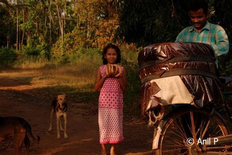 Windy Skies A Goan Poder Paddles His Pao Around