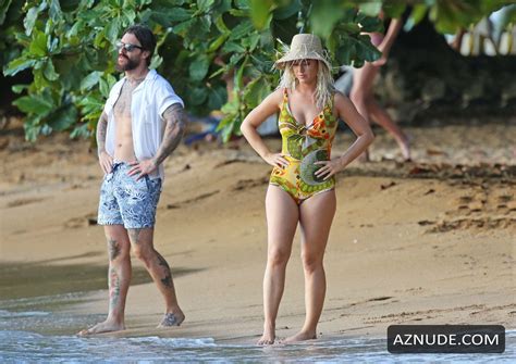 Katy Perry Shoots A Music Video In A Yellow One Piece Swim Suit In