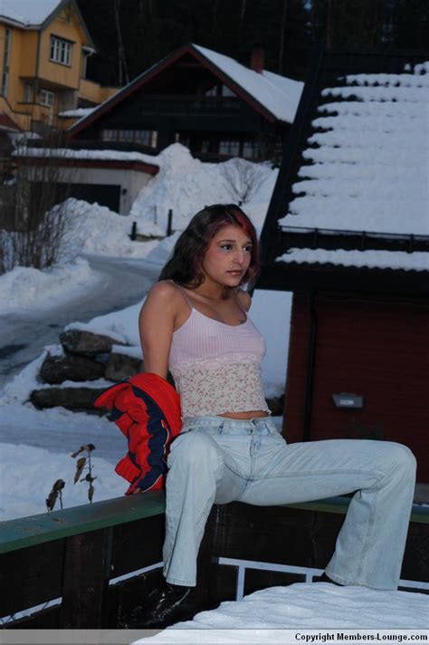 Sexy Indian Teen Poses On Snow Covered Ground Before Going Nude On A