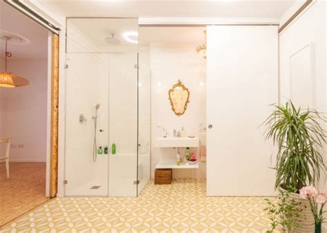 Sliding Chipboard Panels Utilise Space In Madrid Apartment