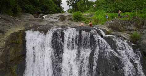 Friends Bathing At A Waterfall In A Tropical Forest Free Stock Video