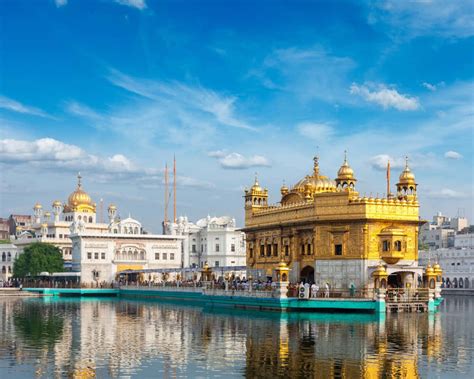 Download Golden Temple With Green Lined Causeway Wallpaper