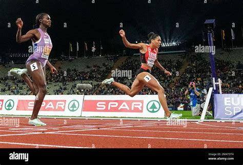 Mujinga Kambundji Of Switzerland Right Finishes In Front Of Dina
