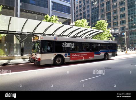 Cta Transit Bus Moving At Speed Past Bus Stop On Chicago Illinois
